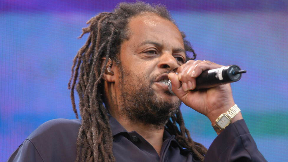Tribute to 'striking, joking' ex-UB40 member Astro - BBC News