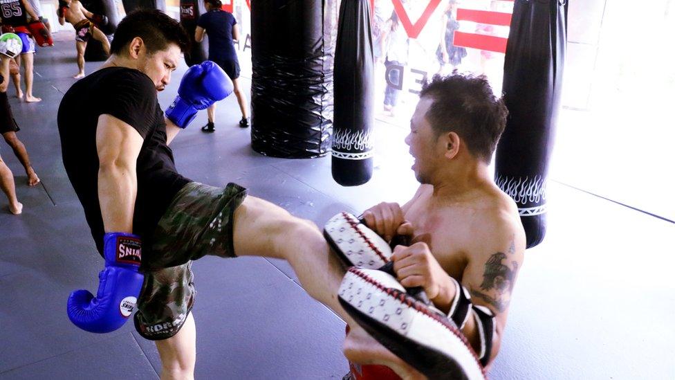 Fighting fit: How one man built a martial arts empire - BBC News