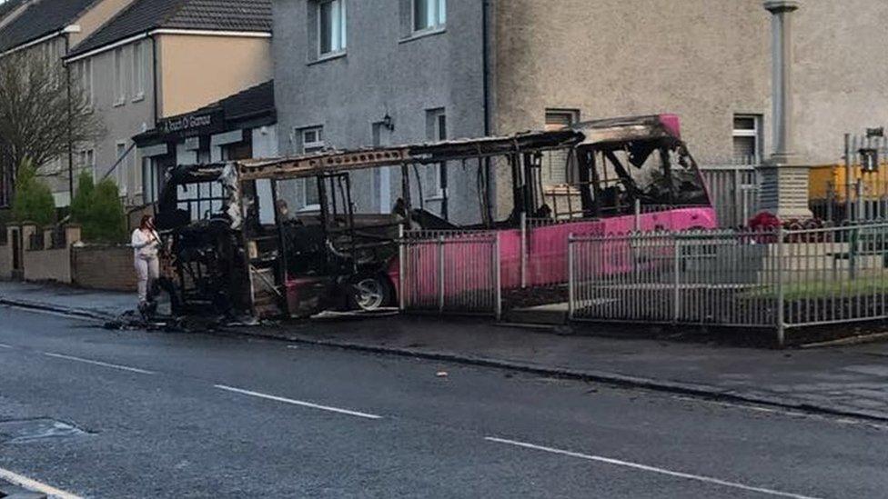 Bus completely destroyed by fire near Motherwell - BBC News