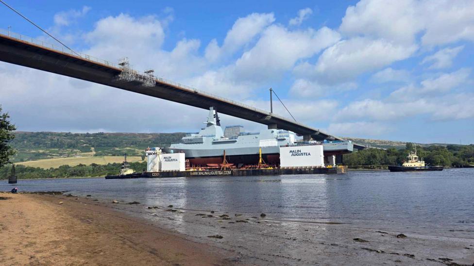 New Navy frigate HMS Cardiff makes first journey on giant barge - BBC News