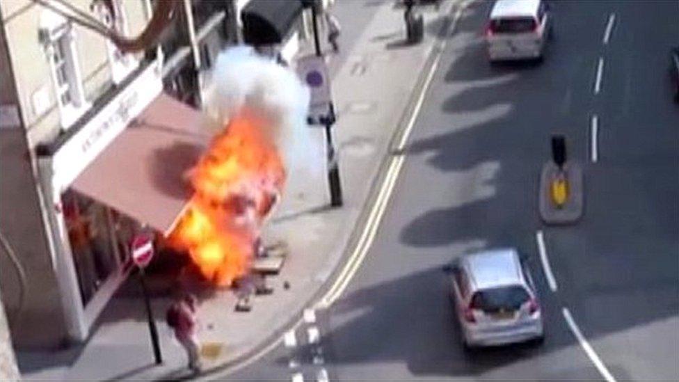 Pavement 'explodes' in Blackfriars injuring woman - BBC News
