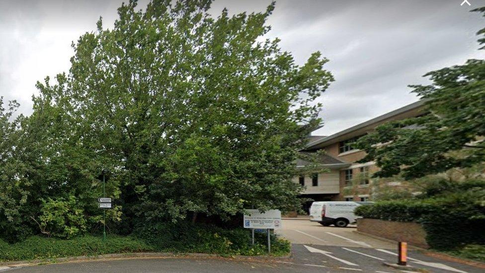 Esher: Man in his 50s dies at town centre building site - BBC News