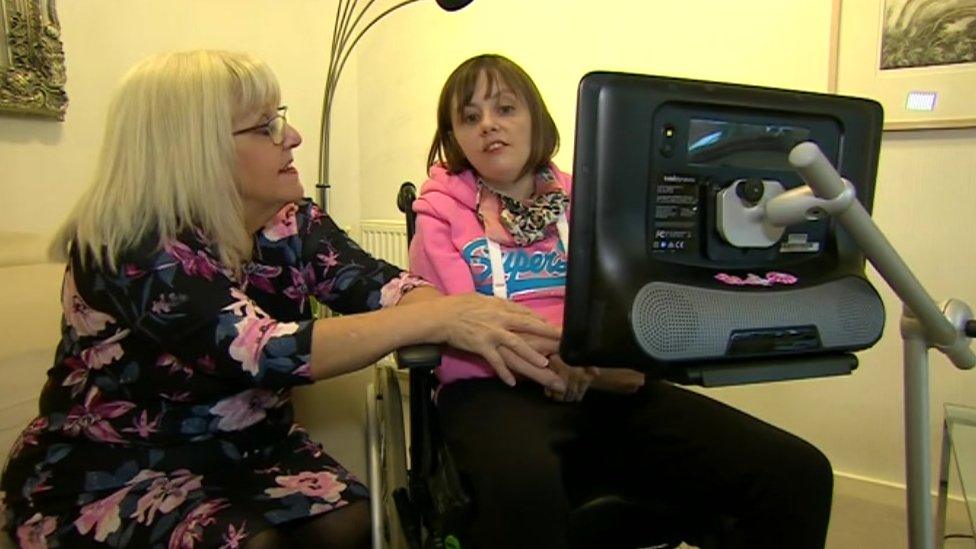 Kidderminster mother's joy as disabled daughter 'given voice' - BBC News