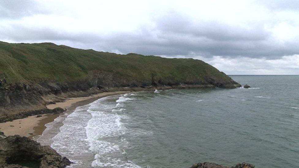 Woman rescues boy, nine, from sea at Blue Pool Bay, Gower - BBC News