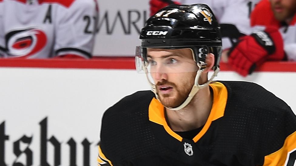 After death of player Adam Johnson, how dangerous is ice hockey? - BBC News