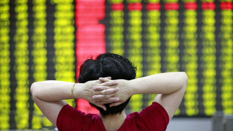China shares continue to slide after massive sell-off - BBC News