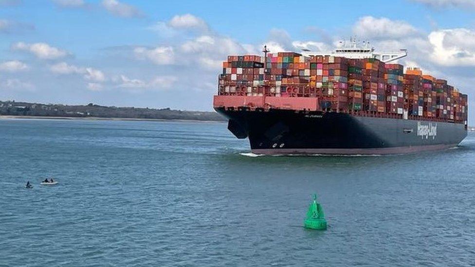 Man in dinghy in near miss with Southampton-bound container ship - BBC News