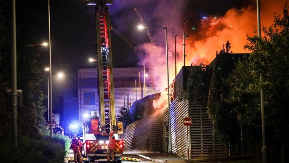 Cars destroyed in fire at Stockport Land Rover showroom - BBC News