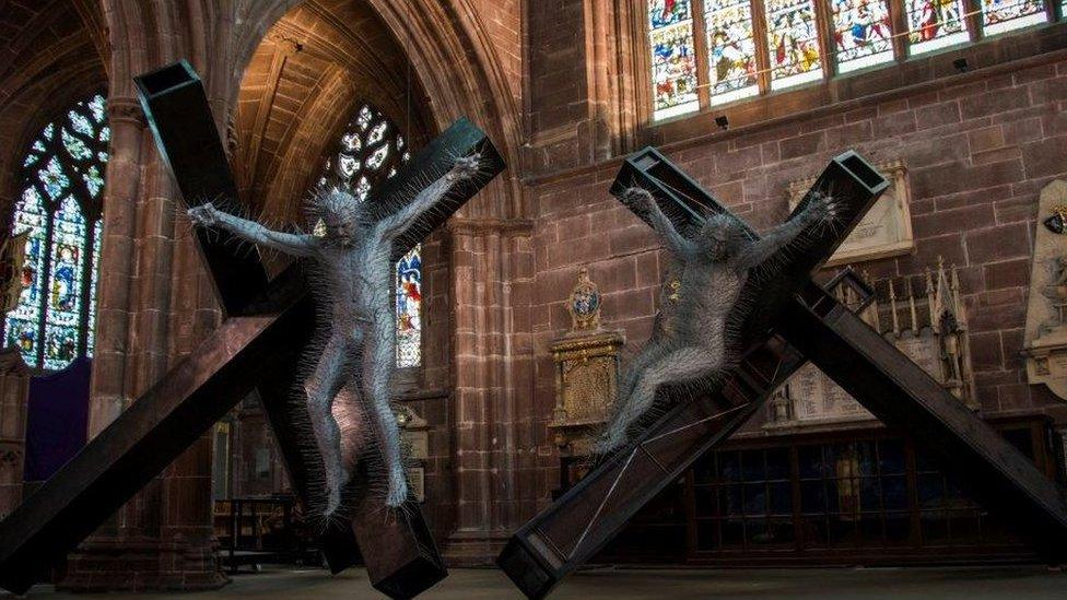 Chester Cathedral unveils coat hanger crucifixion sculptures - BBC News