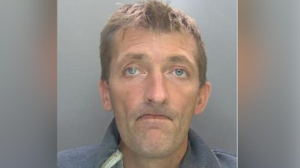 Burglar who beat mother in front of children jailed - BBC News
