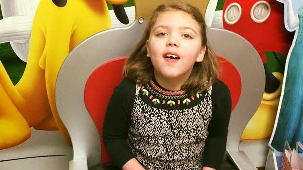 Girl, 9, diagnosed with 'one in a million' BPAN disorder - BBC News