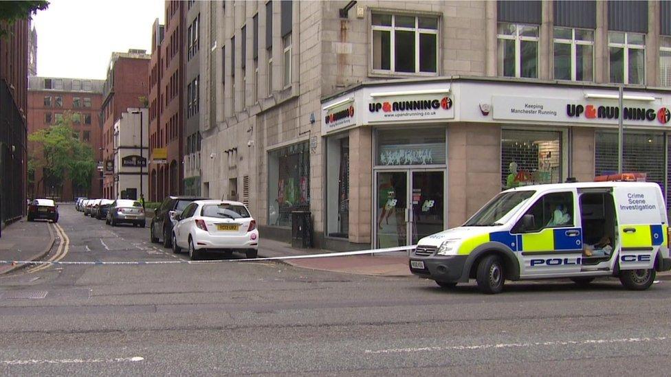 Two stabbed as groups clash in Manchester city centre - BBC News