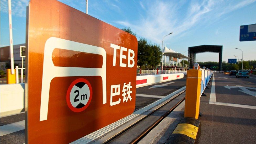 China's 'straddling bus' hits its final roadblock - BBC News