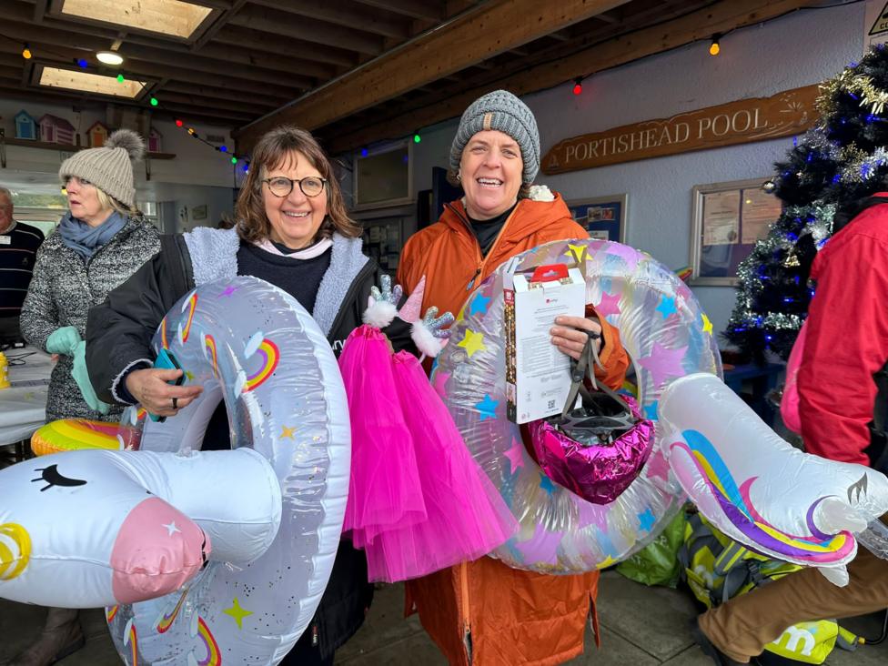 Swimmers in fancy dress raise funds for Portishead lido - BBC News
