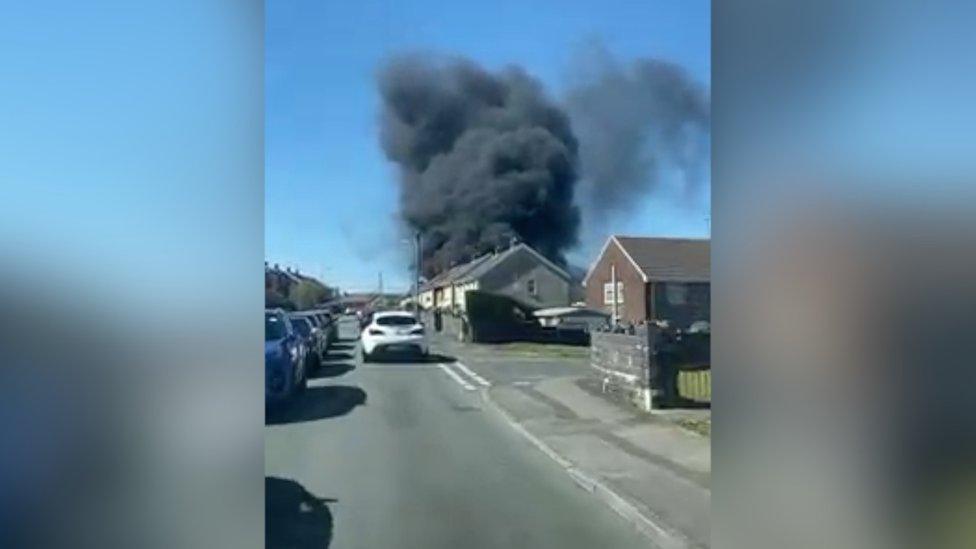 Cimla fire: Couple return from holiday to damaged home - BBC News
