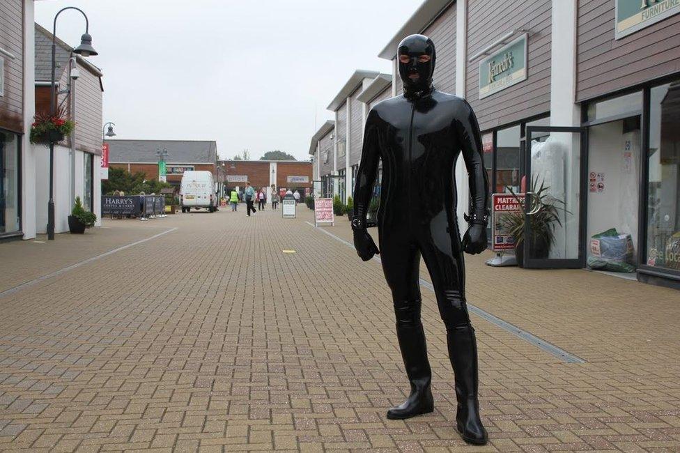 Man has 'Gimp Man of Essex' tattooed on his leg for charity - BBC News