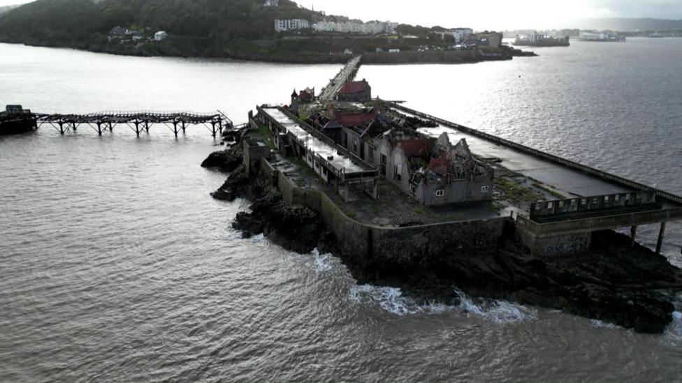 Work to restore crumbling historic pier is under way - BBC News