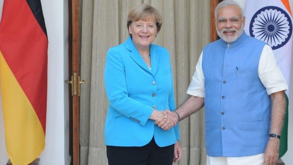 Angela Merkel signs key business deal with India's Narendra Modi - BBC News