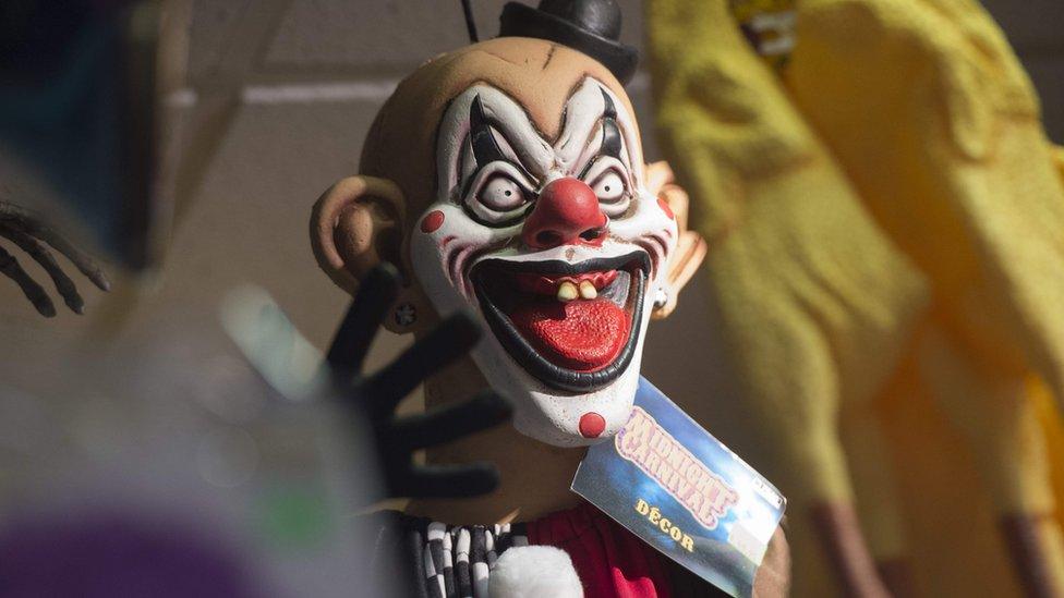 Newspaper headlines: Trump 'on the gropes' and 'killer clowns' - BBC News