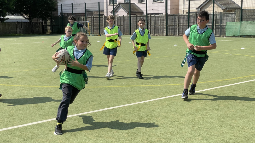 Jersey coach hopes Reds inspires new tag rugby players - BBC News