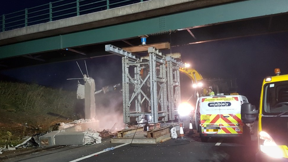 M6 bridge propped up after lorry crash in Lancashire - BBC News