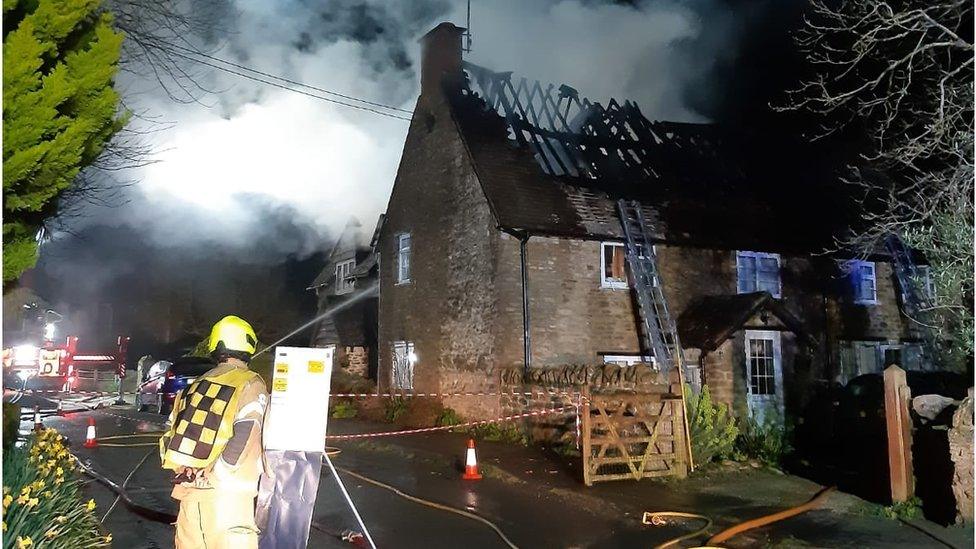 Littleton fire: Trapped resident rescued by neighbours - BBC News