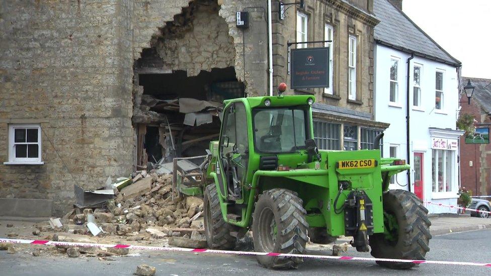 Cash machine tractor raid leaves hole in Beaminster shop - BBC News