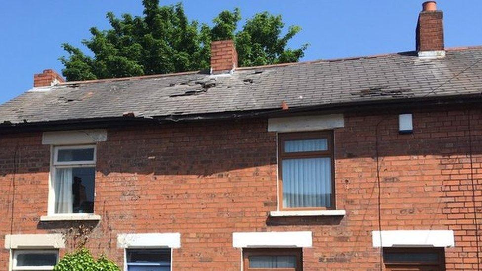 Roof rampage causes damage to homes and cars - BBC News