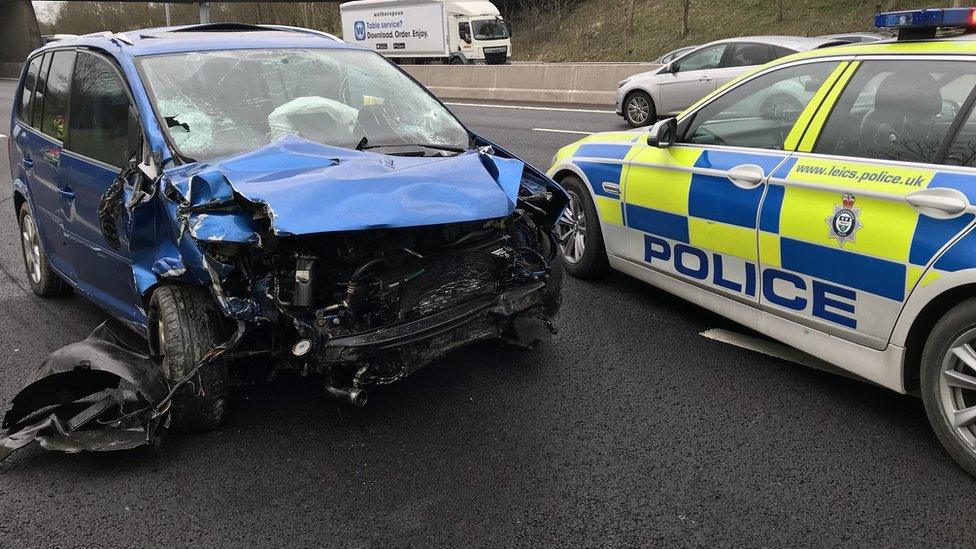 Woman hurt as overturned car closes M1 in Northamptonshire - BBC News