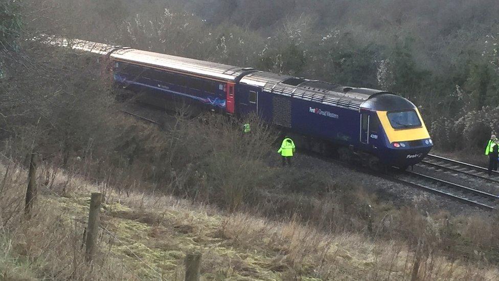 Train line reopens after level crossing death - BBC News