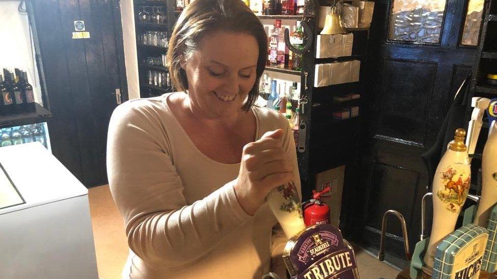 Former bar manager reopens historic Berrynarbor pub - BBC News