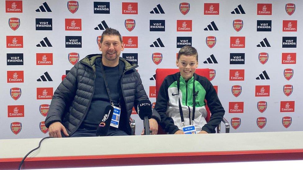 Jersey boy walk out as Liverpool FC mascot at Emirates - BBC News