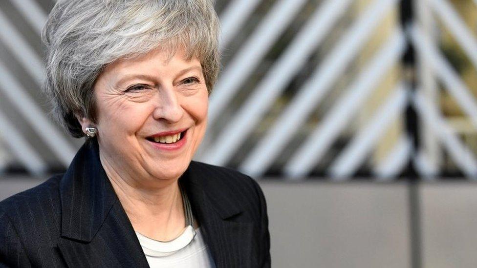 Newspaper headlines: May survives, but for how long? - BBC News