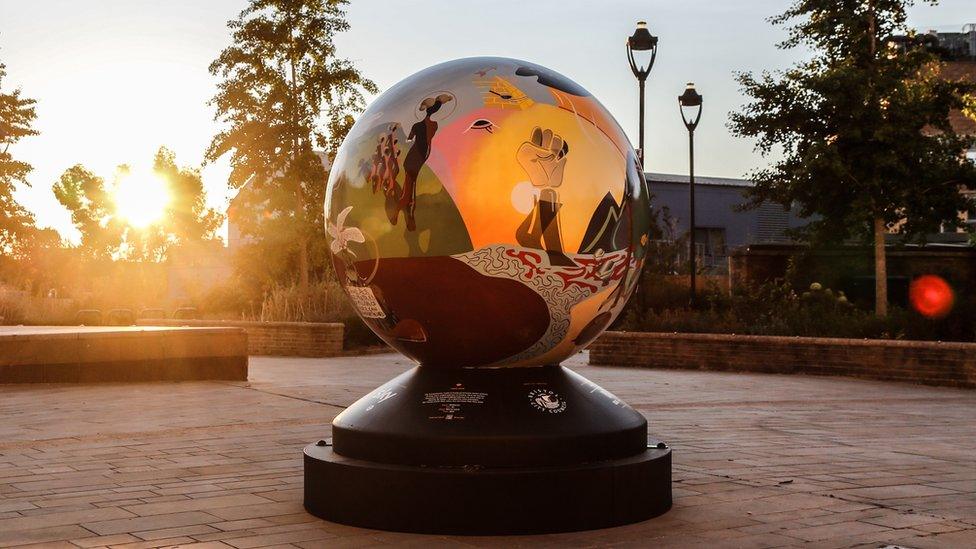 Globe art installation explores racial inequality through British ...