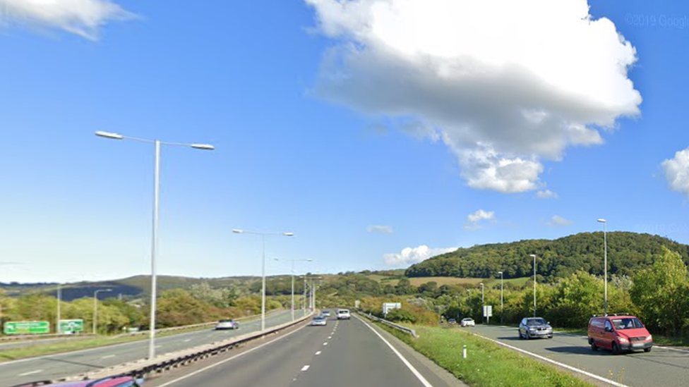 A55 motorists drive wrong way up slip road in traffic - BBC News