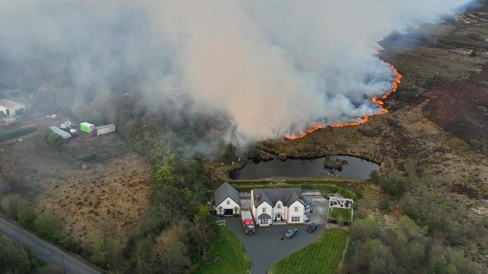 NI wildfires: Man 'owes everything' to fire crews who saved home - BBC News