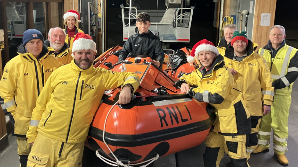 Teen rescued on live TV at Wells 'thankful' for RNLI crew - BBC News