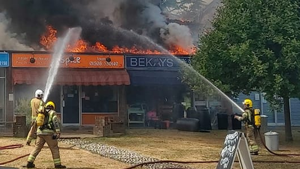 Long Stratton fire: Shop manager thanks crews after blaze - BBC News