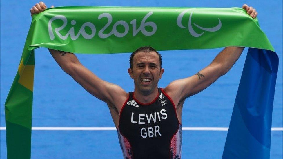 Lydney homecoming for Paralympic triathlete Andy Lewis - BBC News