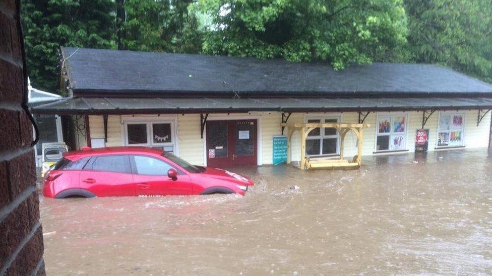 Flash floods strike Poynton, Disley and Stockport - BBC News