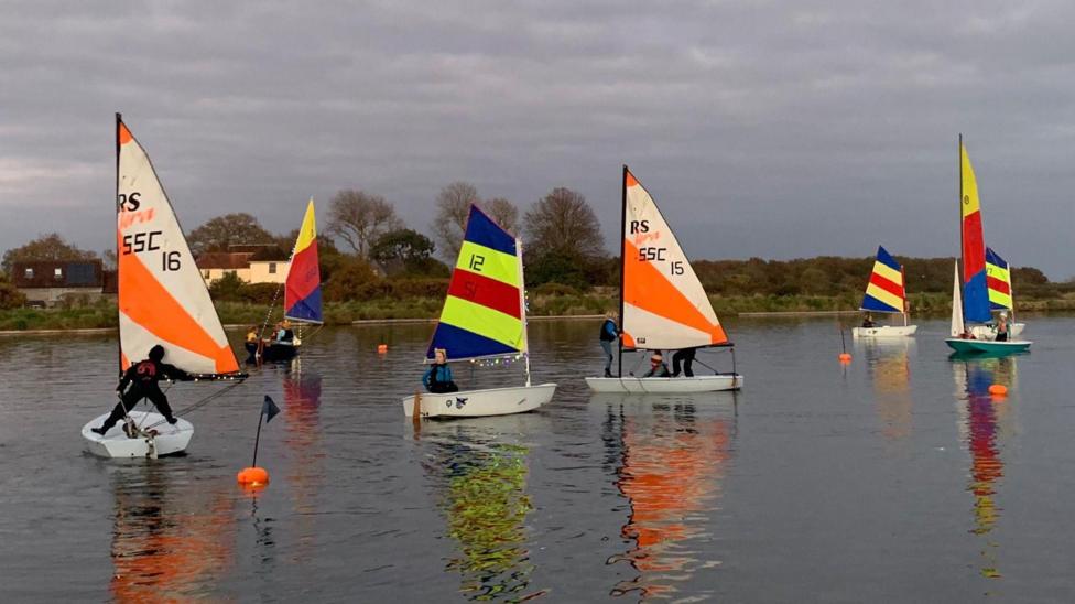 Children in Need: Sailing club completes 24-hour challenge - BBC News