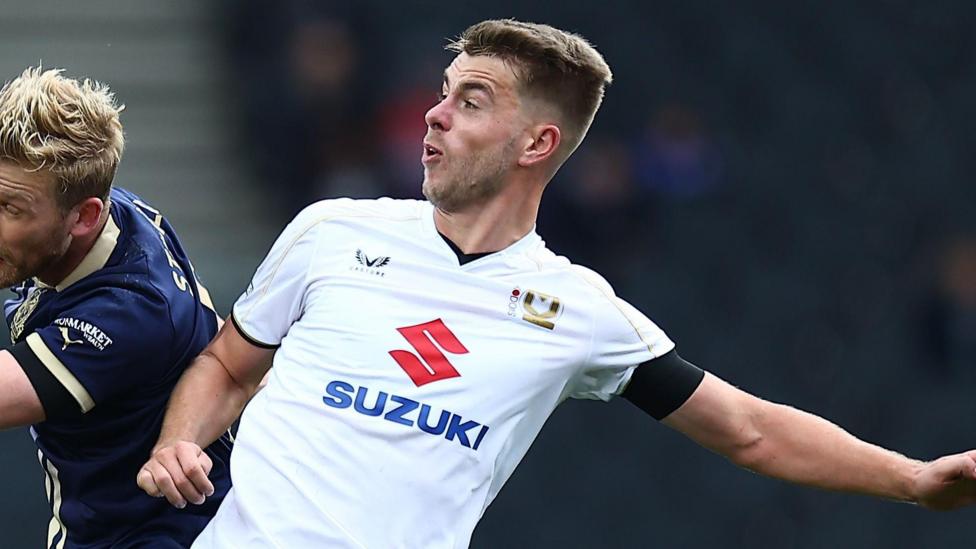 Jack Tucker: Colchester United sign MK Dons defender on loan - BBC Sport