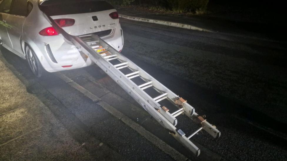 Lancashire Police stop car with ladders sticking out of boot - BBC News