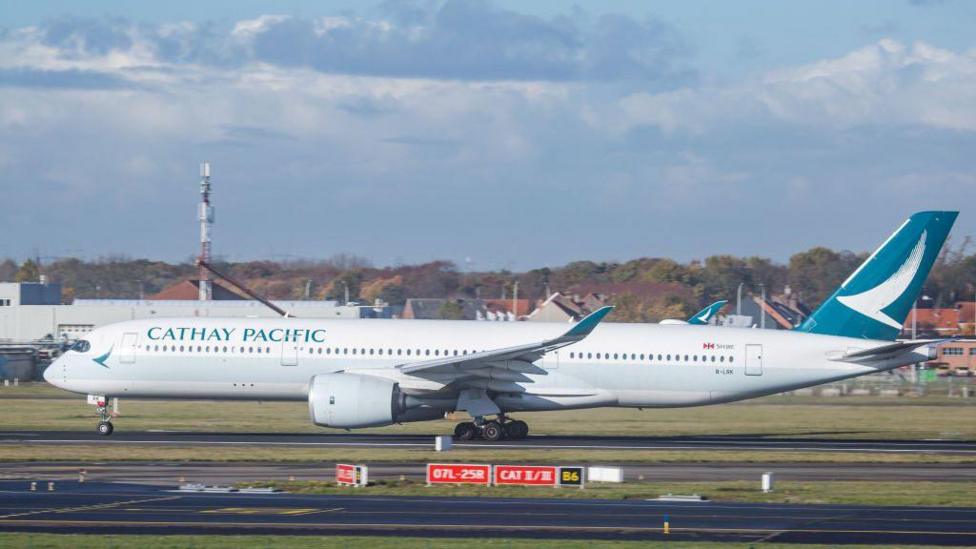 Cathay Pacific grounds planes after engine problem - BBC News