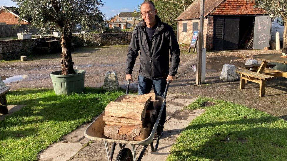Flooded Ringwood pub reopens thanks to community support - BBC News