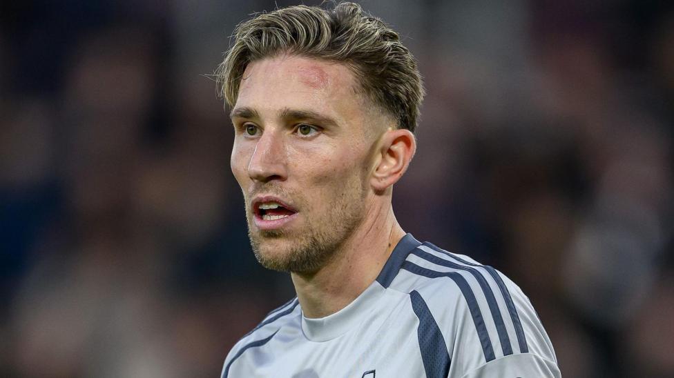 Exeter City sign Ed Turns, Andrew Oluwabori and Angus MacDonald - BBC Sport