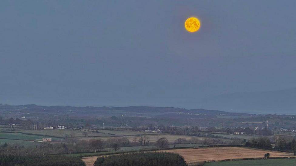 Worm Moon captured over Northern Ireland - BBC News