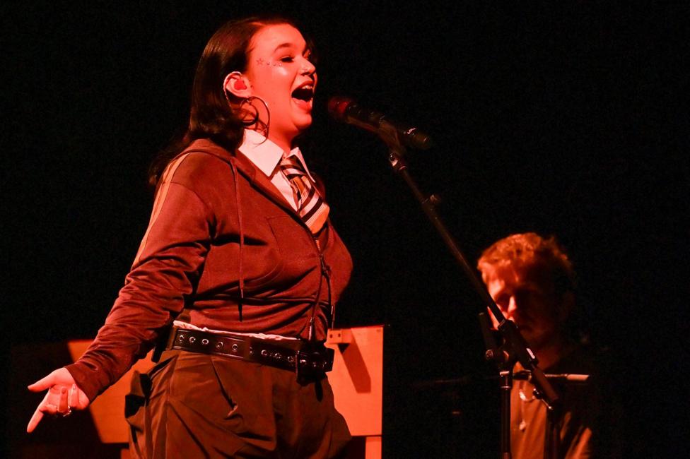 Lola Young: Messy singer back on stage and on form at London Palladium ...