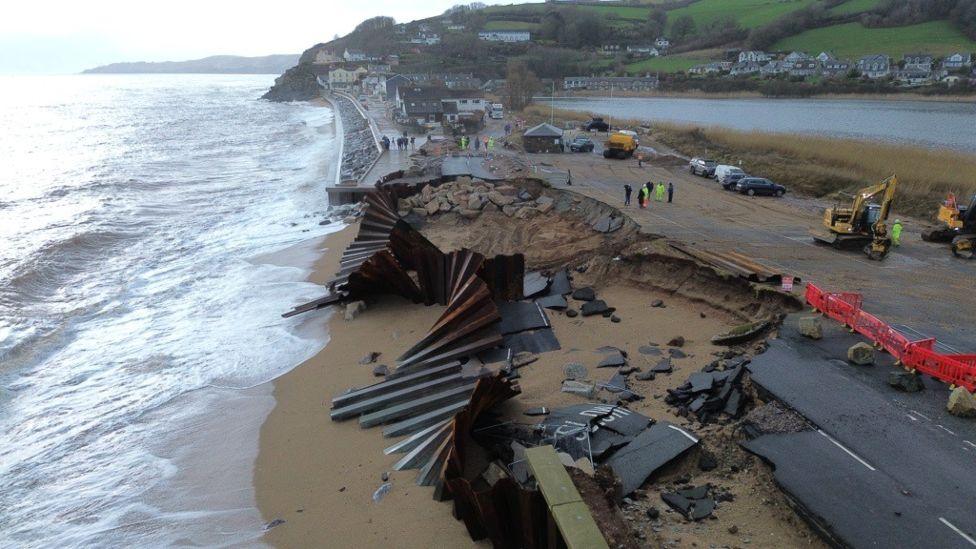 Collapsed coastal road in Torcross is 'catastrophic' to village - BBC News