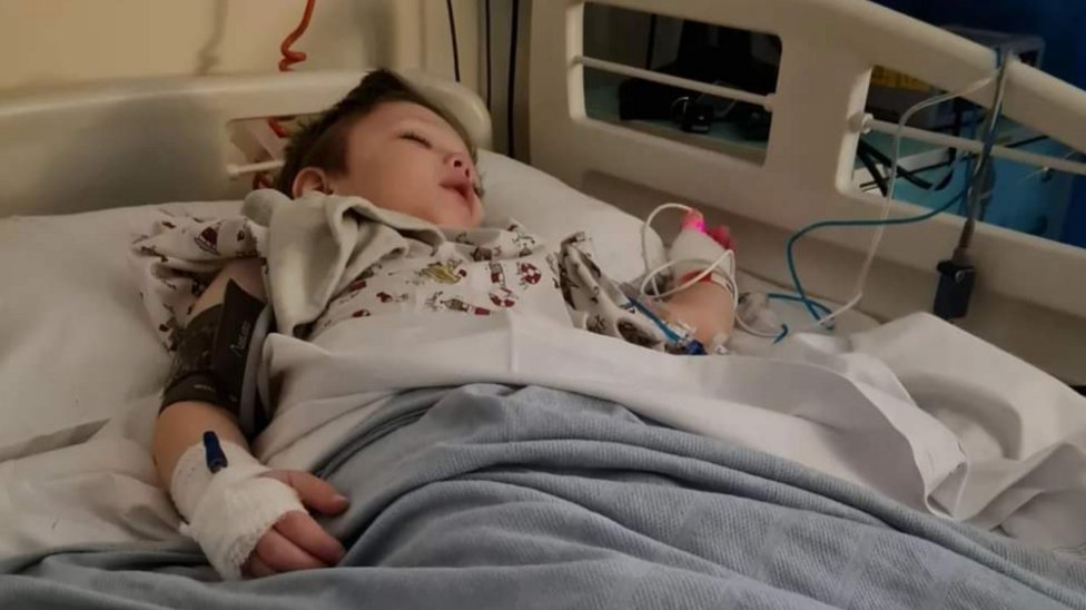 Boy fundraising for 'stoma bears' to help other children - BBC News